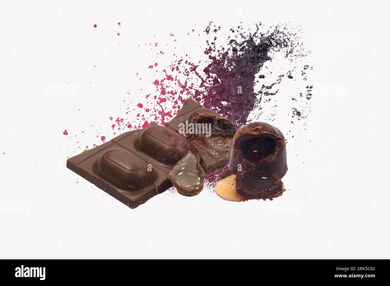 A partially eaten chocolate candy on a white background Stock Photo - Alamy