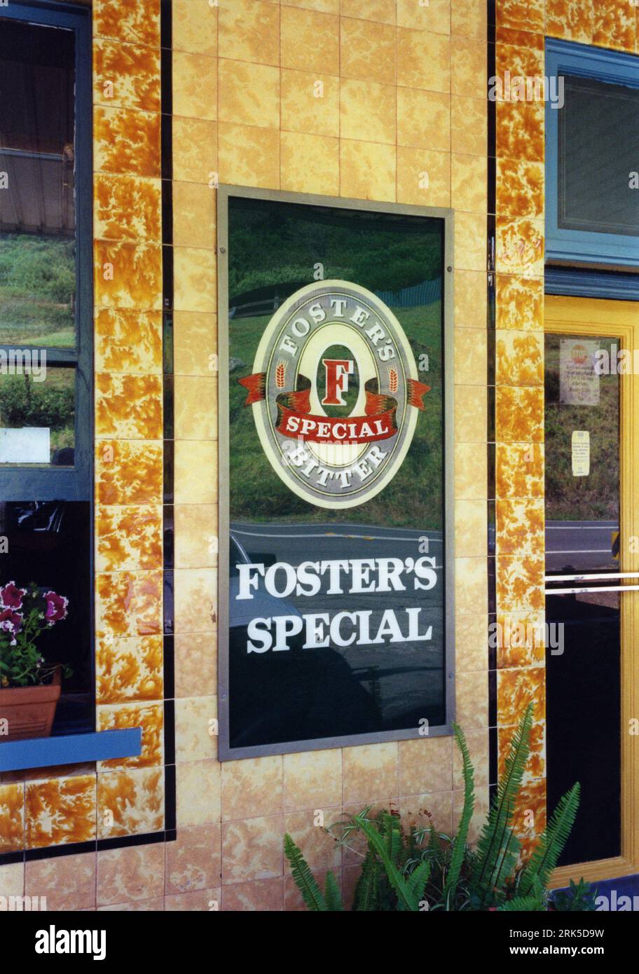 Advertising signa for Foster Special inform abaout which beer is served ...