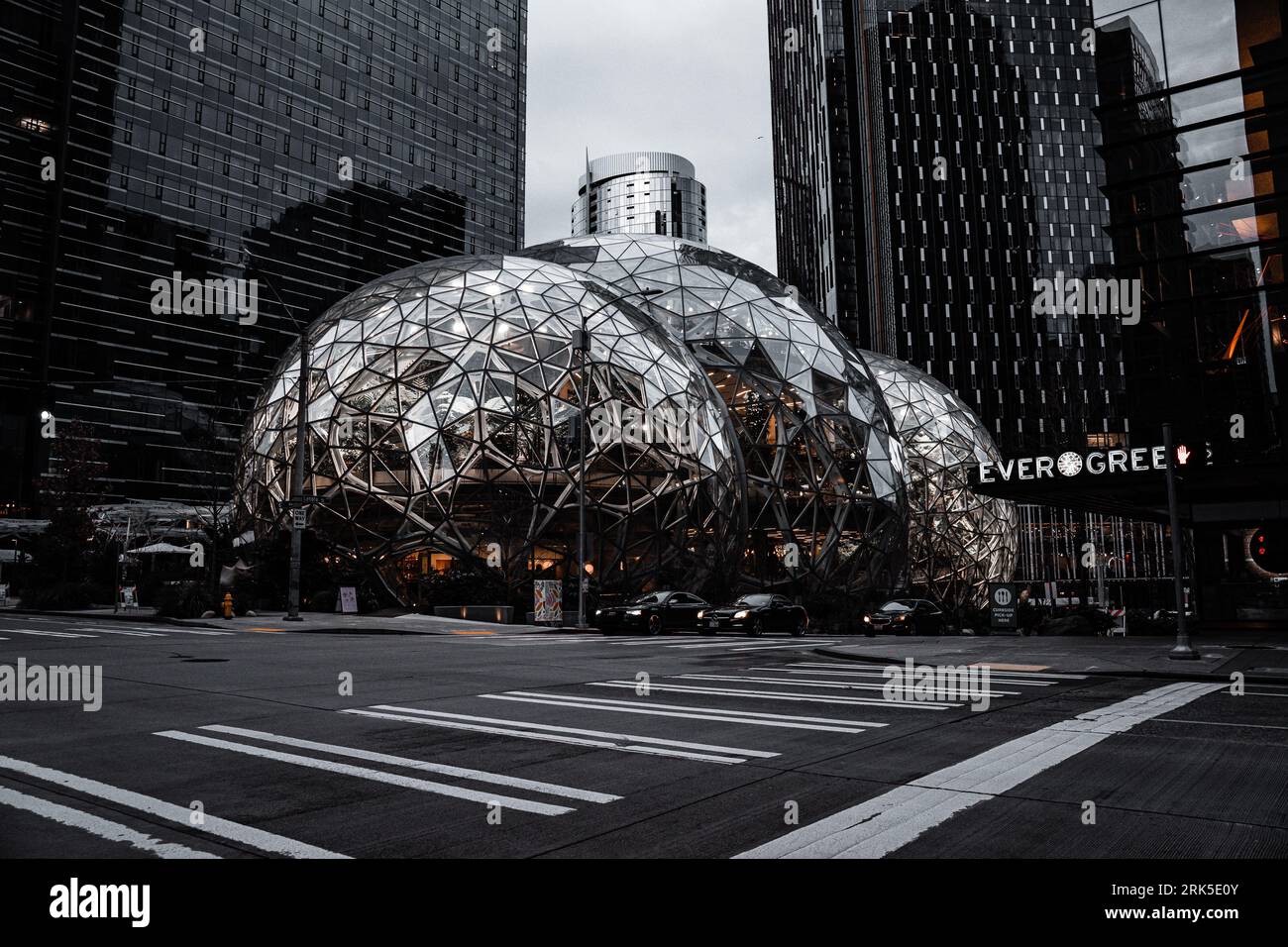 A modern building made of glass in Seattle, Washington on a cloudy day ...