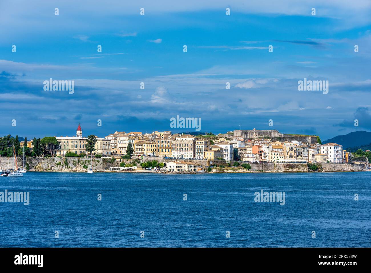 View of the seafront of the old town of Corfu from the sea, with the ...