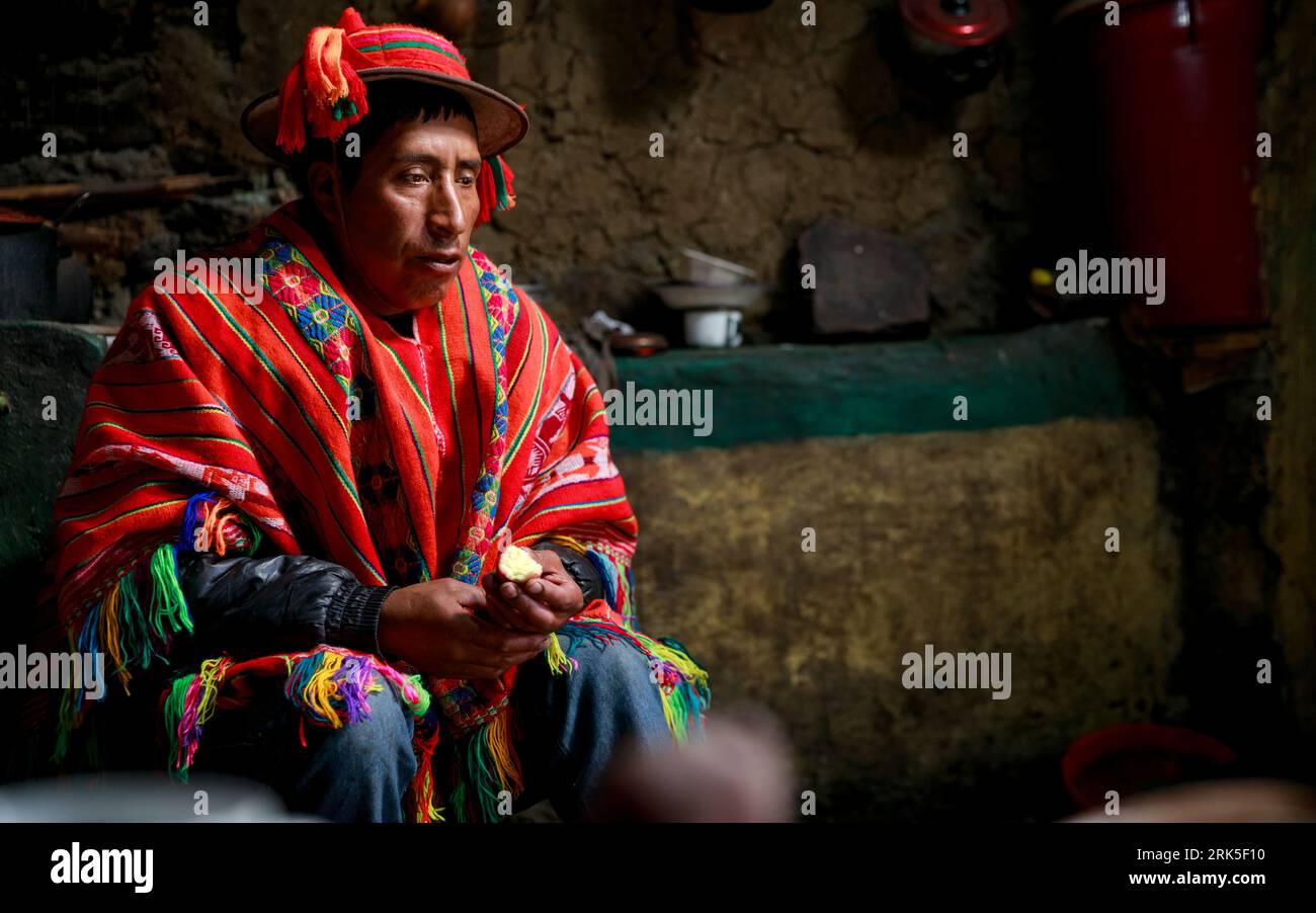The people working, wearing traditional Peruvian dresses Stock Photo ...