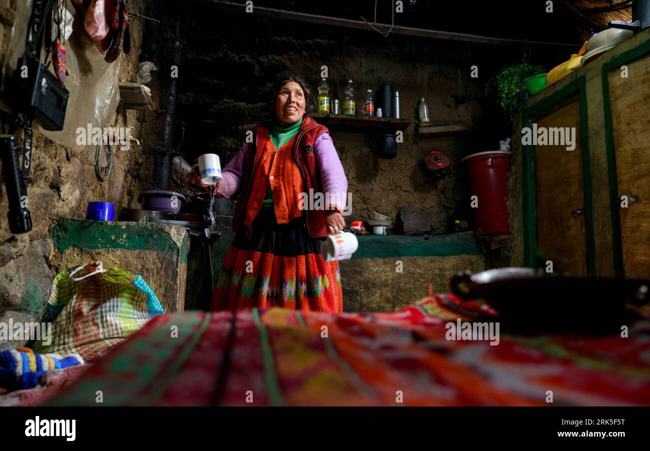 The people working, wearing traditional Peruvian dresses Stock Photo ...