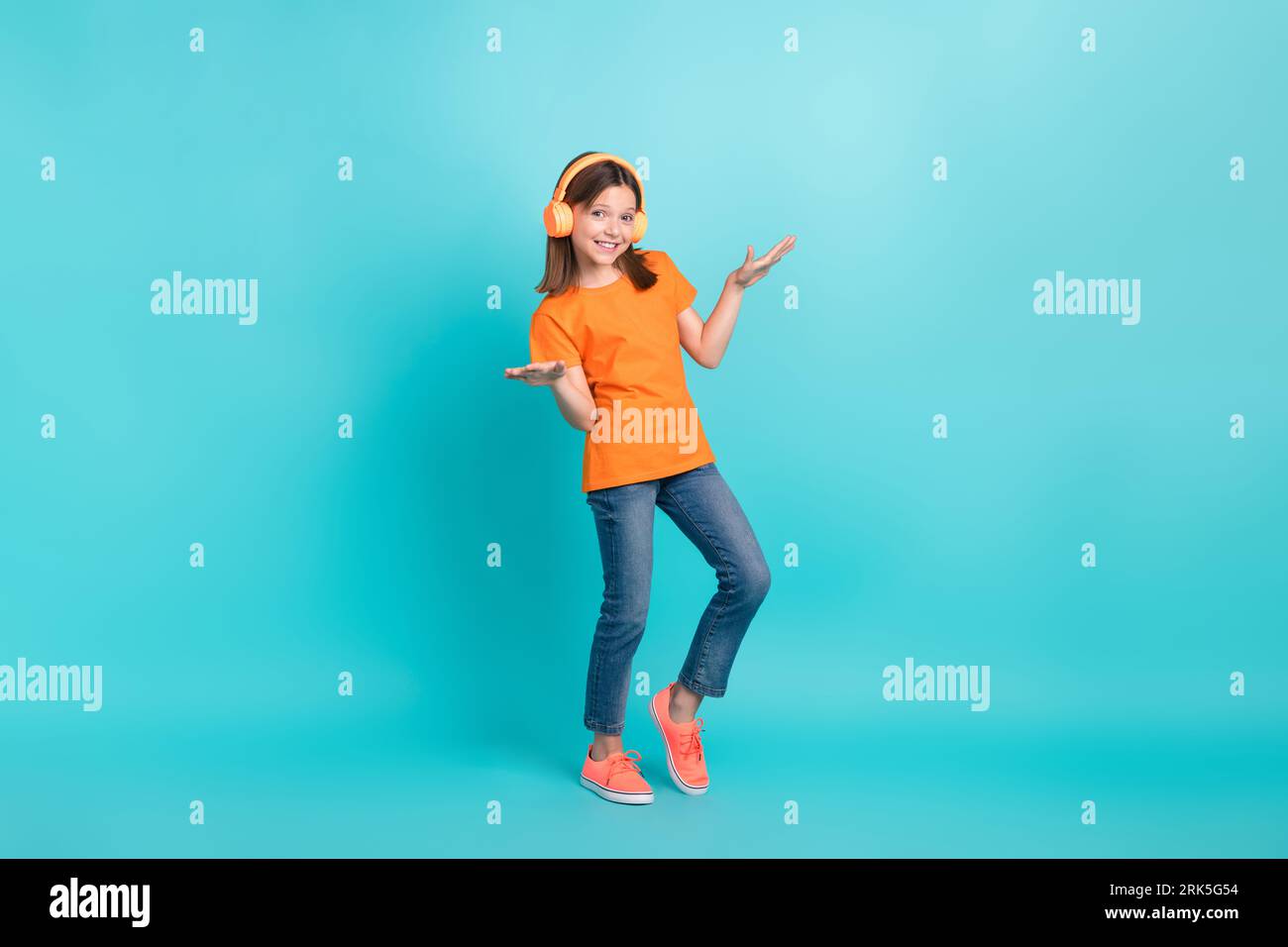 Full length photo of funky cool girl wear trendy clothes listen ...