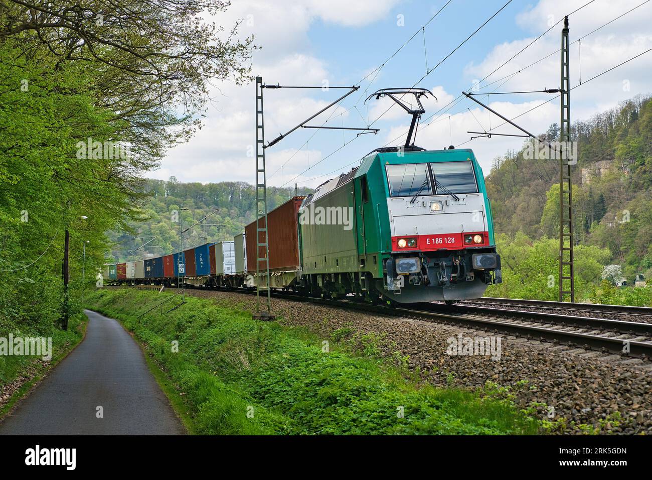 Train traveling through lush green hi-res stock photography and images ...