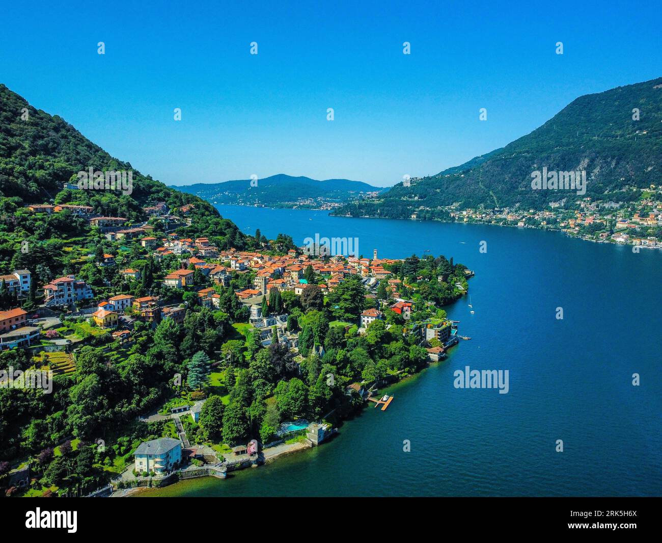 A breathtaking view of Lake Como with majestic mountains in the ...