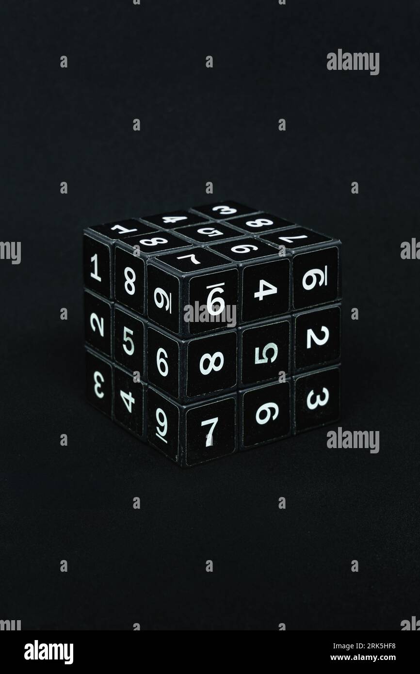 Rubik's Cube in front of a Black Background Stock Photo - Alamy