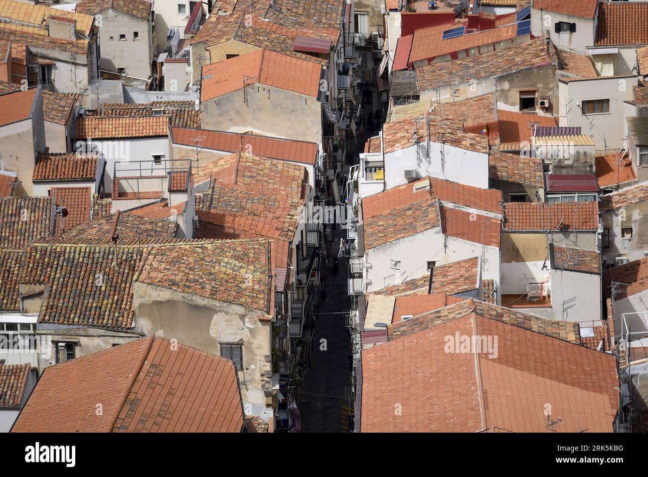 Scenic view of red clay tile rooftops in Cefalù one of the most ...