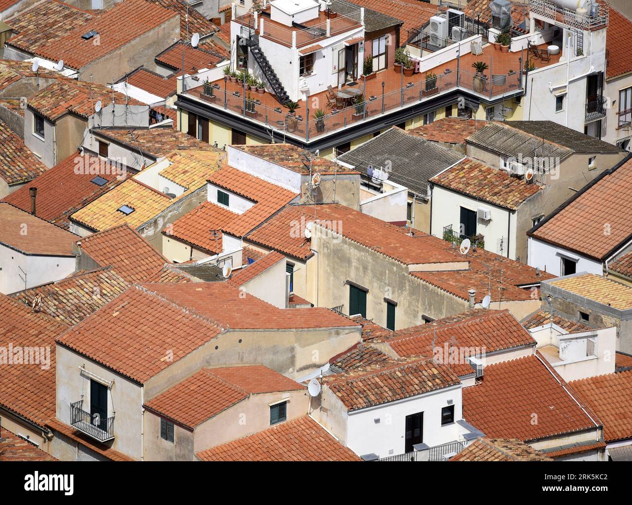 Scenic view of red clay tile rooftops in Cefalù one of the most ...