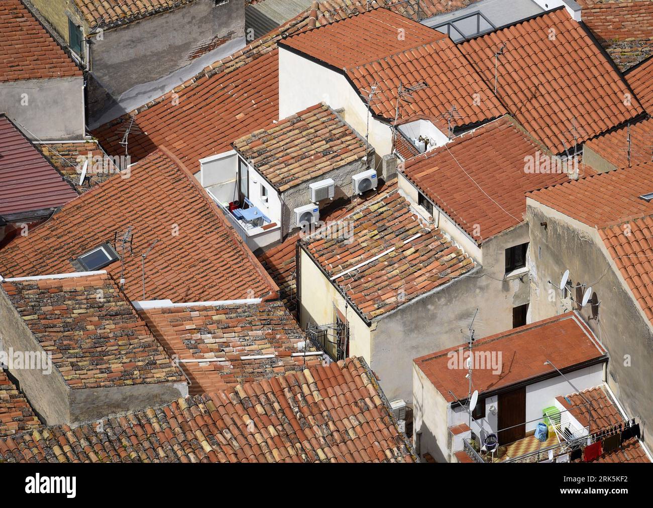 Scenic view of red clay tile rooftops in Cefalù one of the most ...