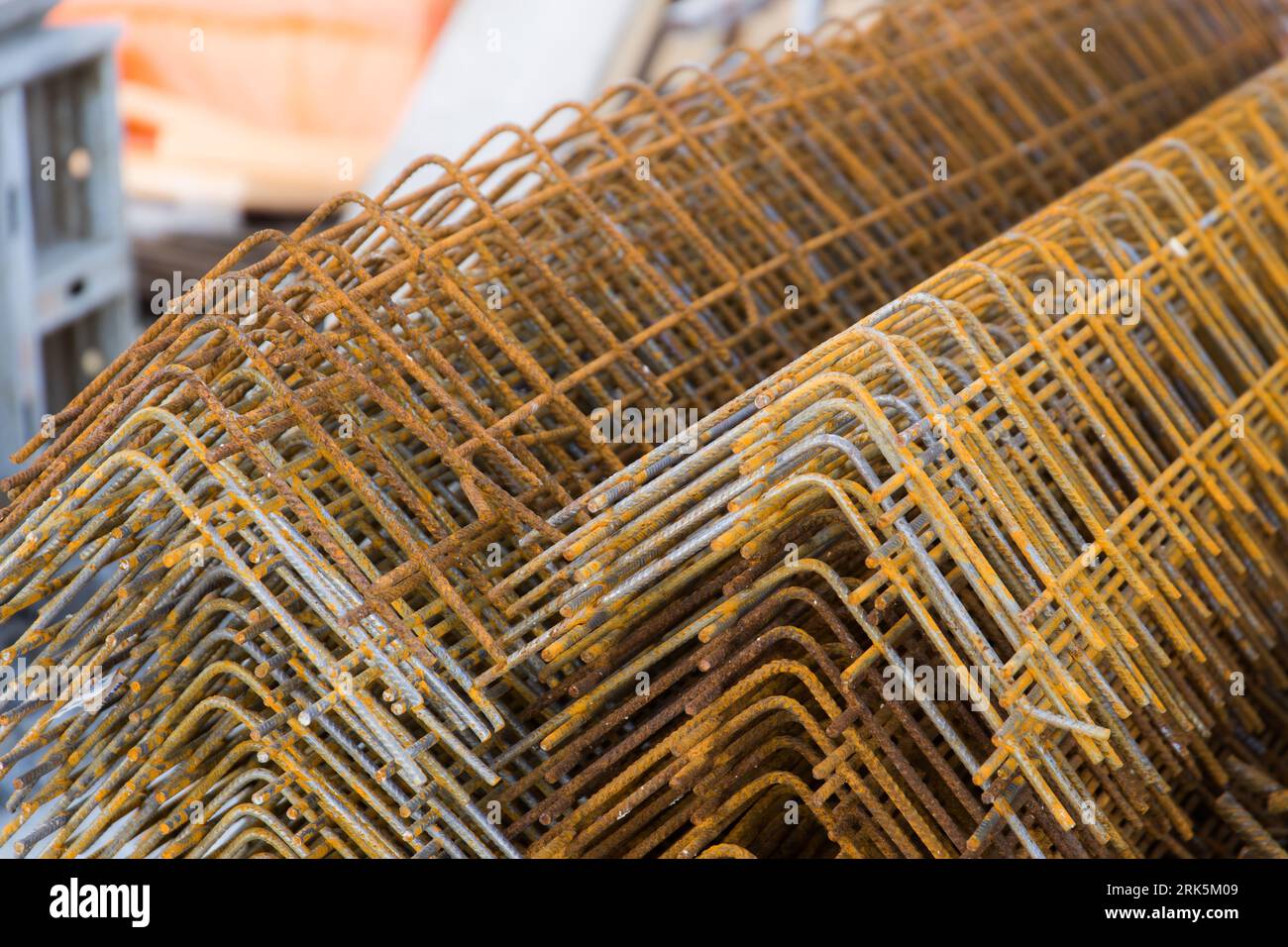 Structural steel with some rust stored on a construction site for later ...