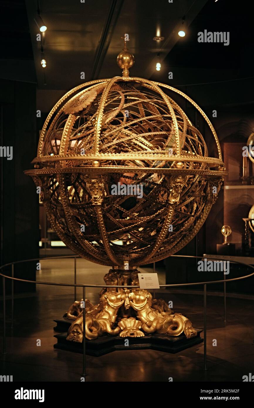 A vertical of a metallic globe miniature at Galileo Museum in Florence ...