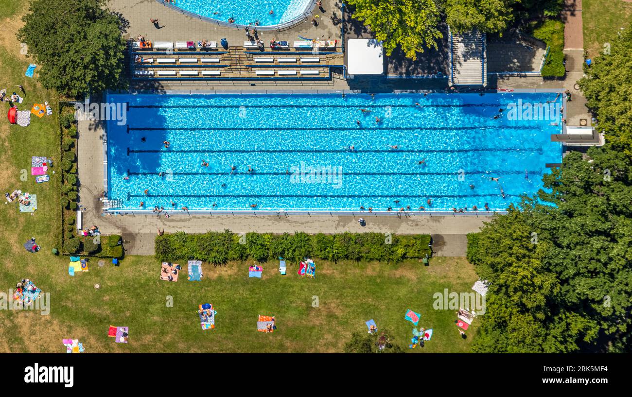 Aerial view, outdoor pool and bathers, sunbathing lawn, Welper ...