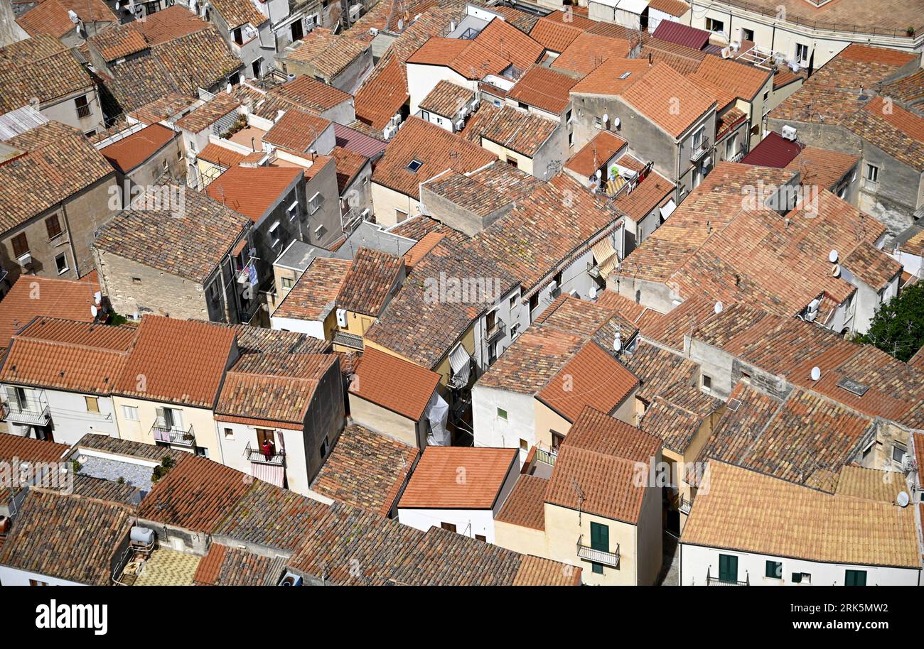 Scenic view of red clay tile rooftops in Cefalù one of the most ...