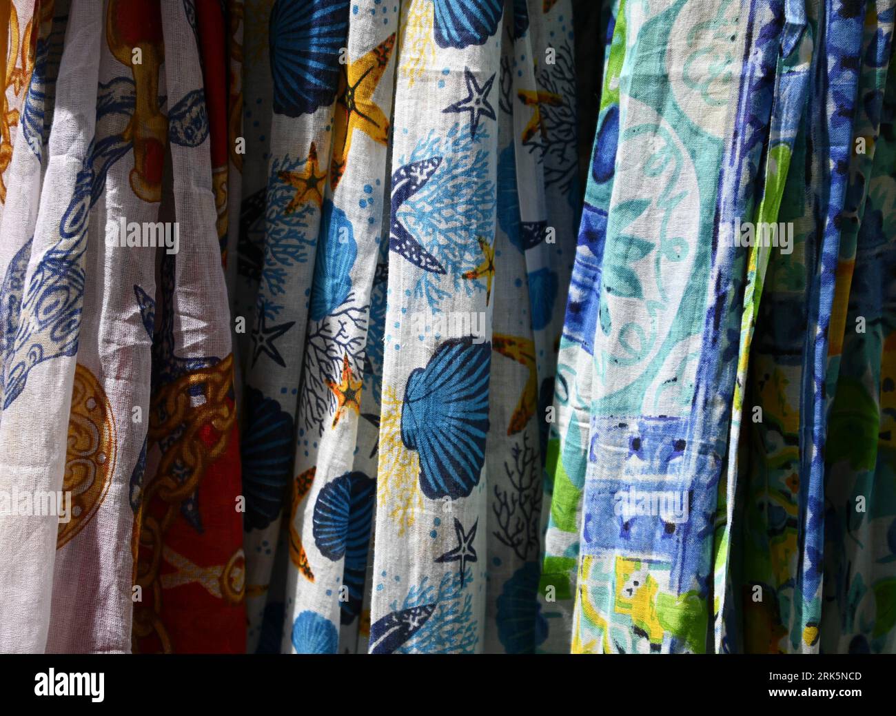 Traditional colorful Sicilian fabrics on display in Cefalù Sicily ...