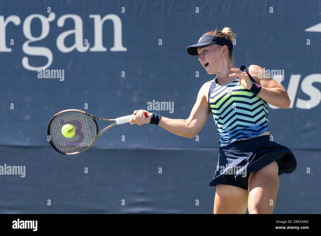 New York, New York, USA. 23rd Aug, 2023. Maria Timofeeva returns ball ...