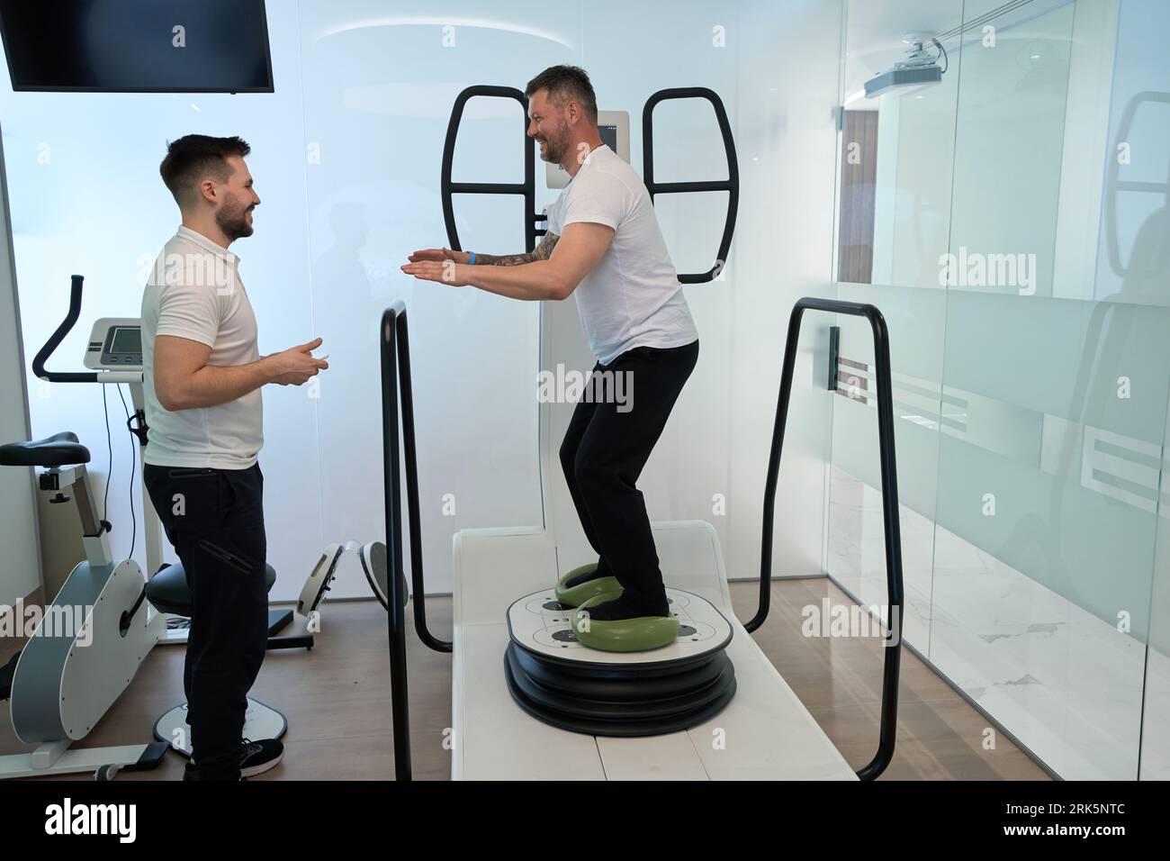 Rehabilitation center patient doing exercise during physical therapy ...
