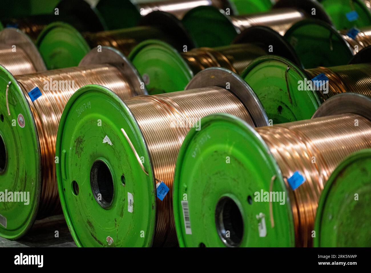 Cologne, Germany. 24th Aug, 2023. Cable drums with coiled copper cable ...