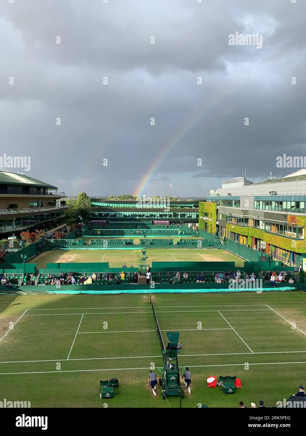 A view of a tennis court in Wimbledon, UK, with a spectacular rainbow ...