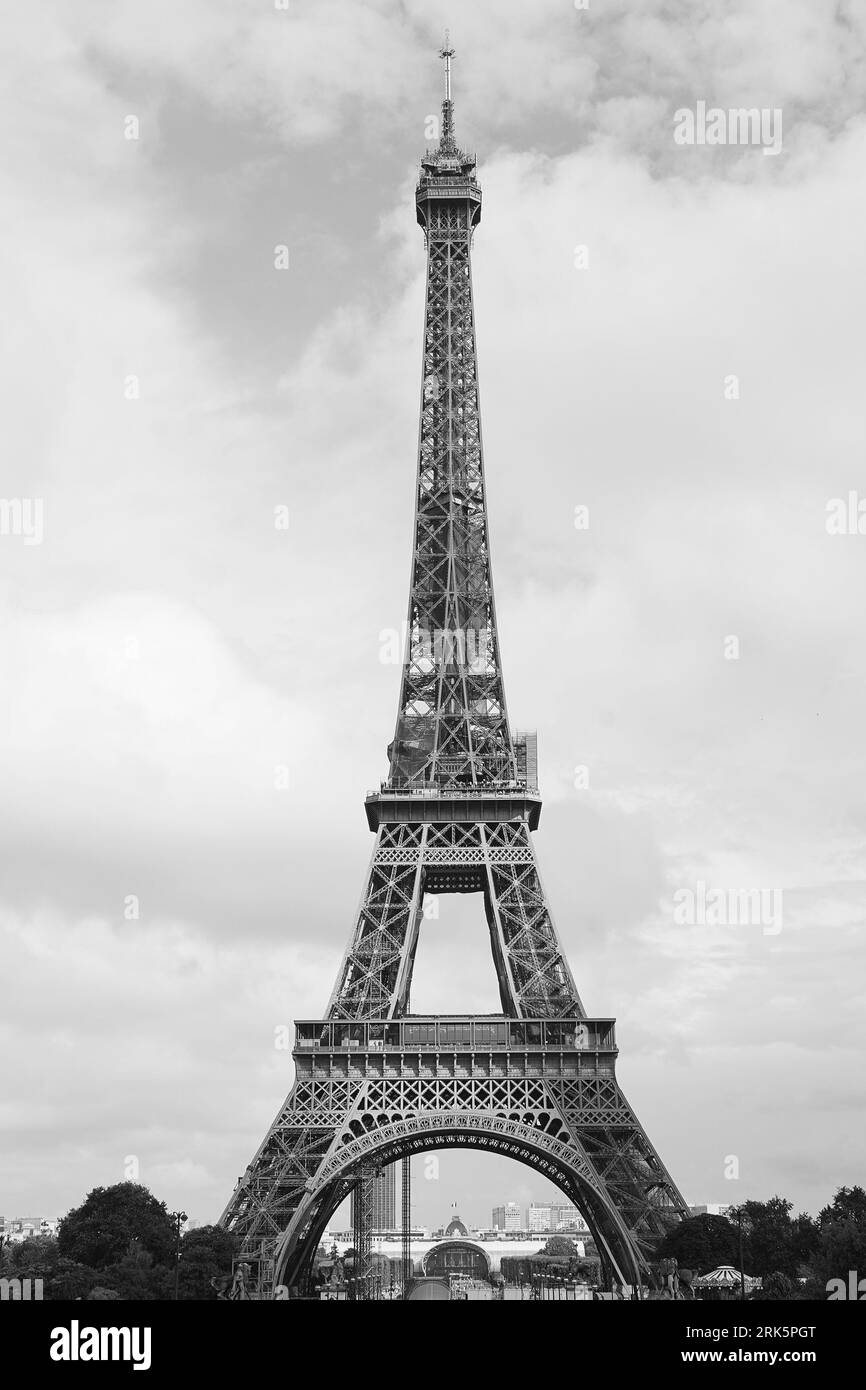 A grayscale of the iconic Eiffel Tower in Paris, France on a sunny day ...