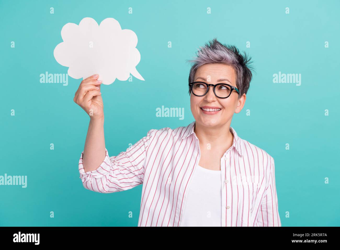 Photo of interested look hold paper bubble cloud idea opinion ...