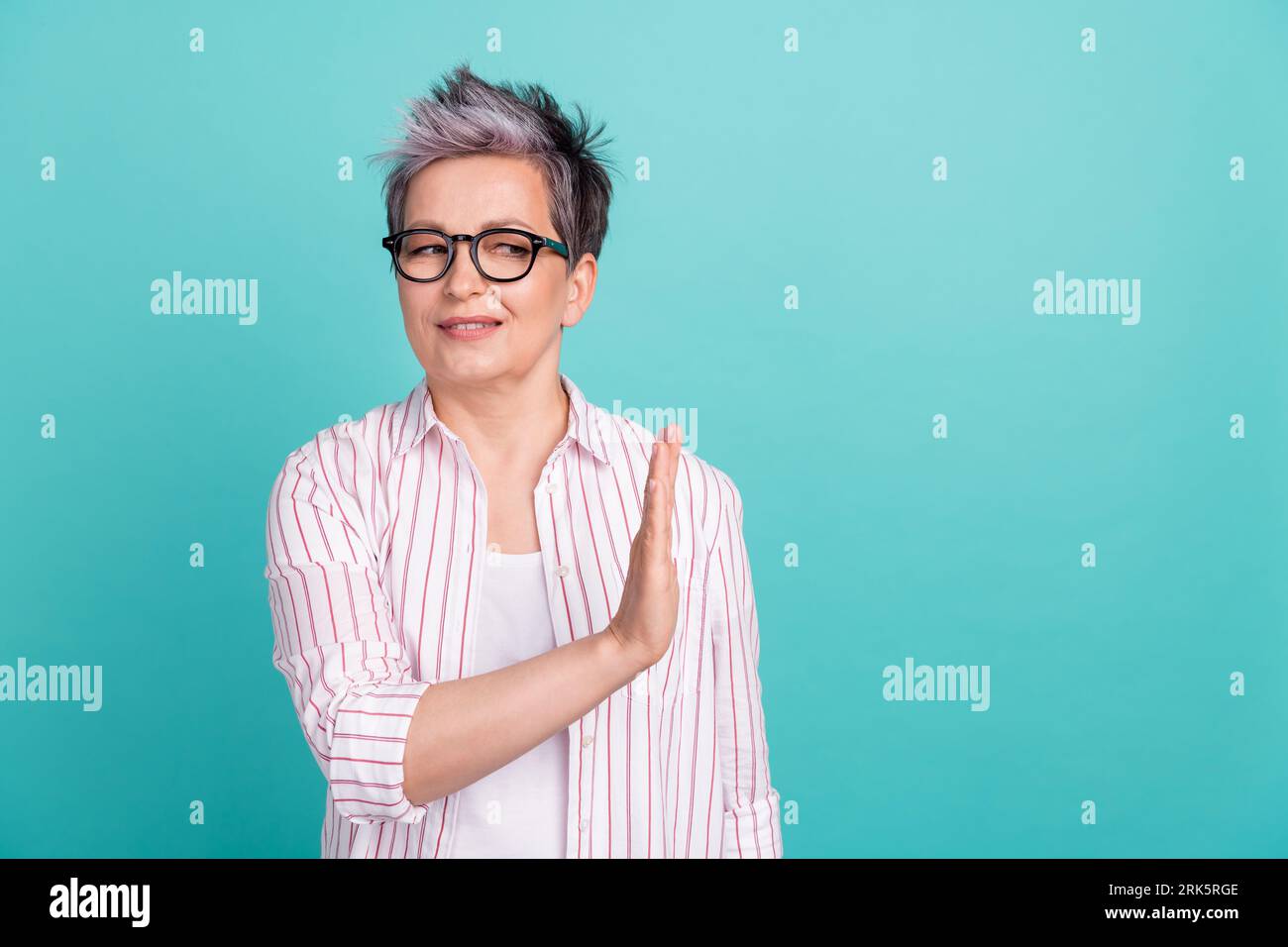 Photo of young woman taboo gesture hand showing her disagree veto ...