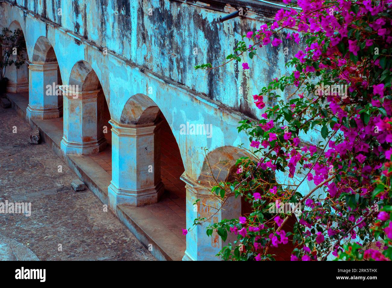 Arches and corridors in the Capuchinas convent in La Antigua Guatemala ...