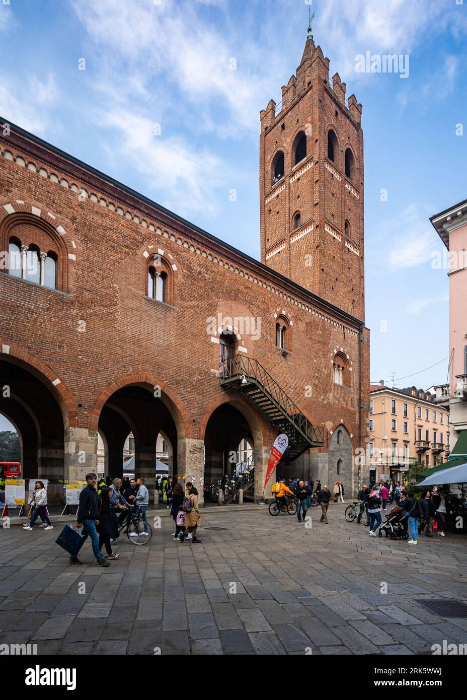 The picturesque tower of the Arengario stands in the center of a ...