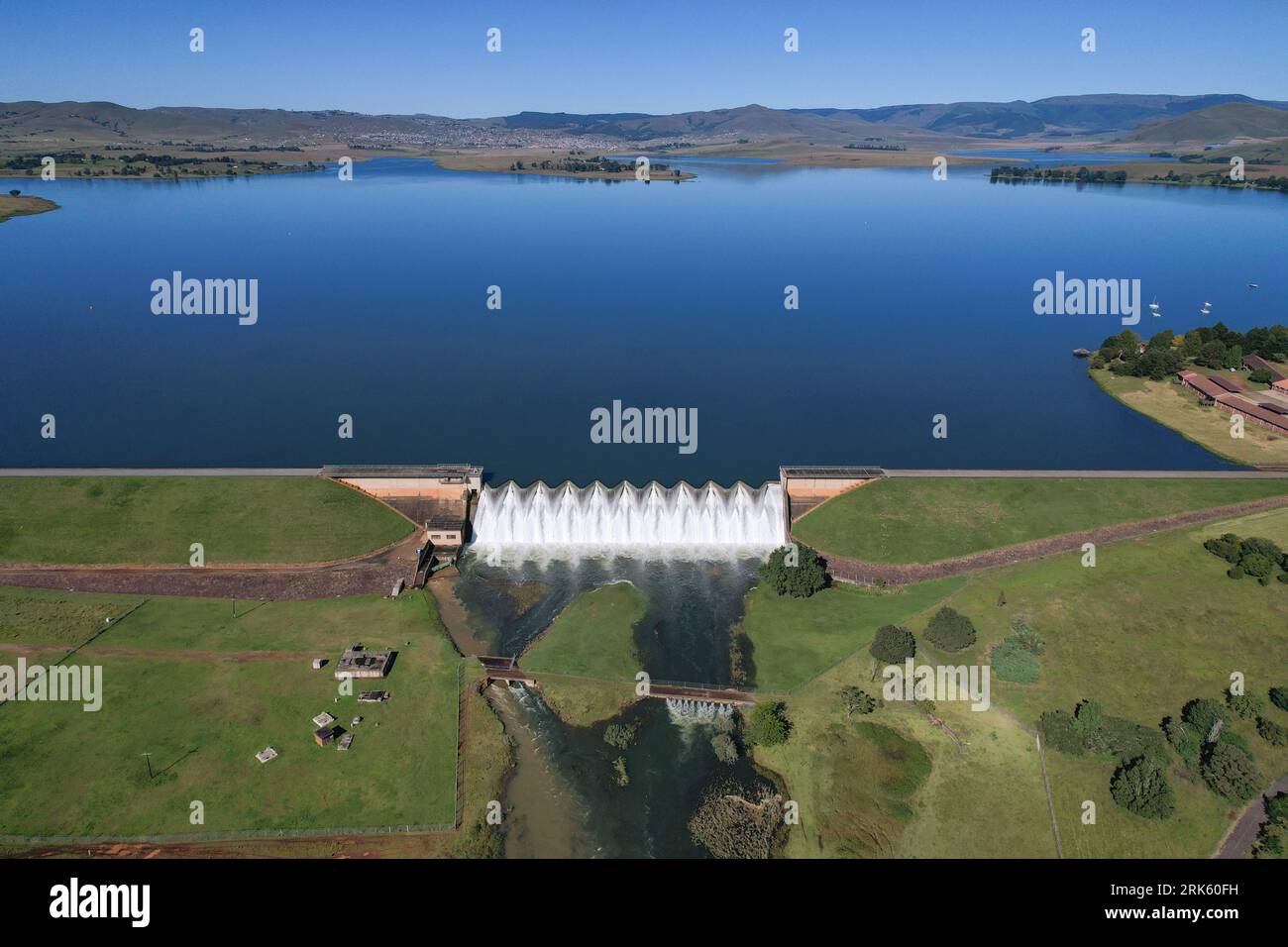 Panoramic view of water flowing over the Midmar Dam Wall in KwaZulu ...