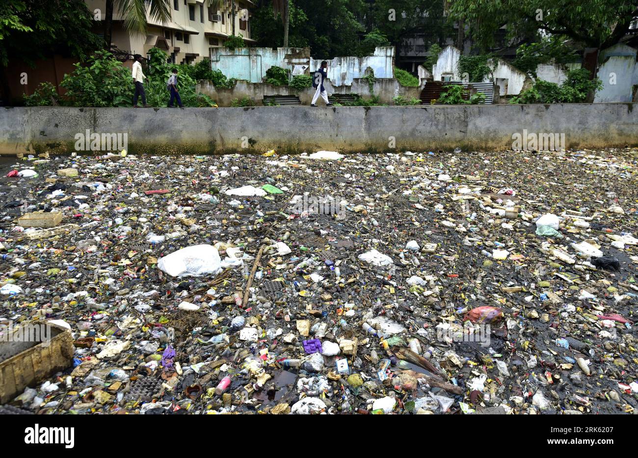 Guwahati, Guwahati, India. 24th Aug, 2023. Scholl students walk through ...