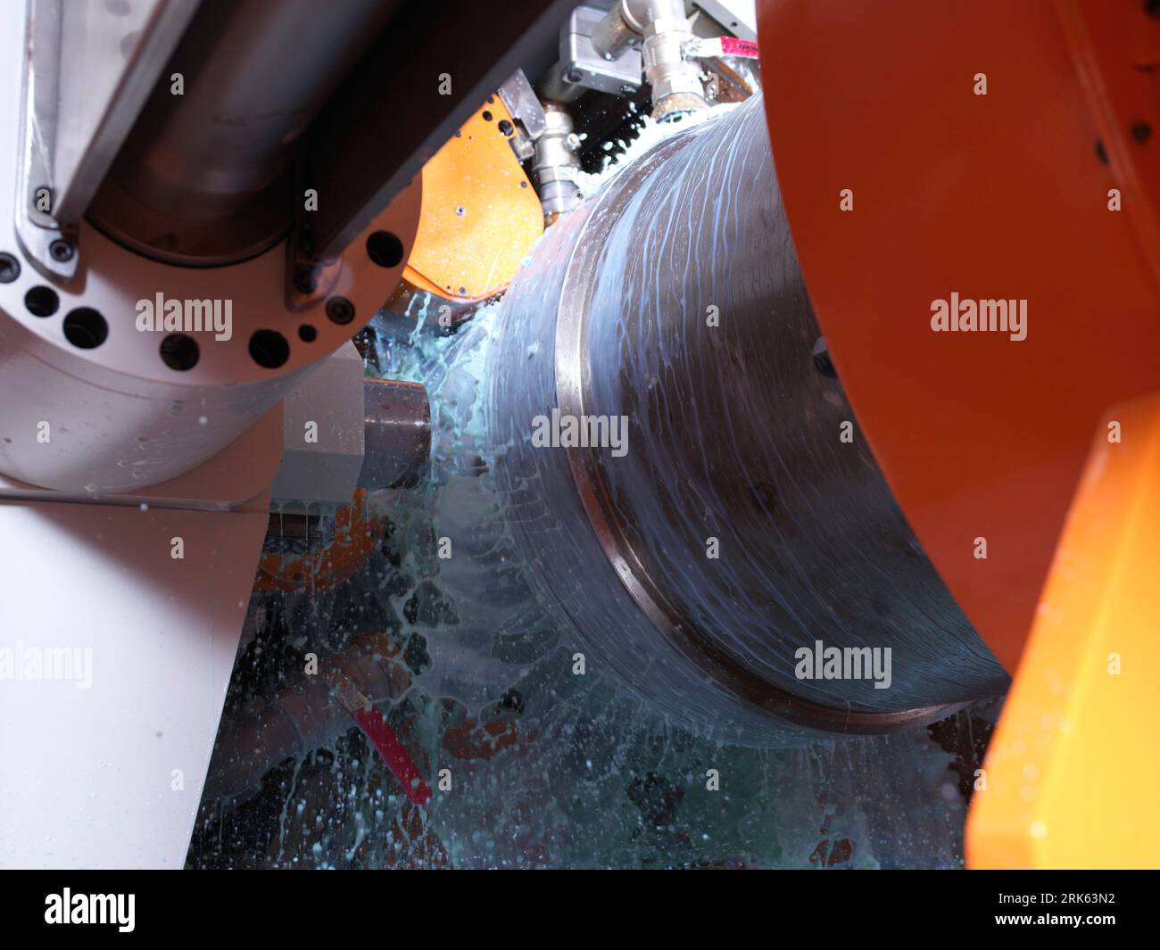 a factory machine works, as its cooling systems cools it down with a ...