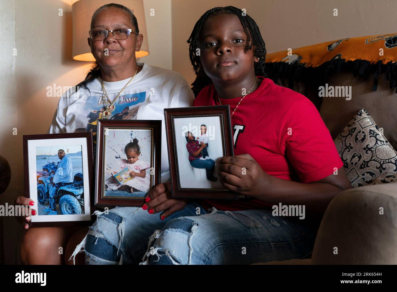 Charlene Roberts and her grandson Princeton Roberts, 11, pose with ...