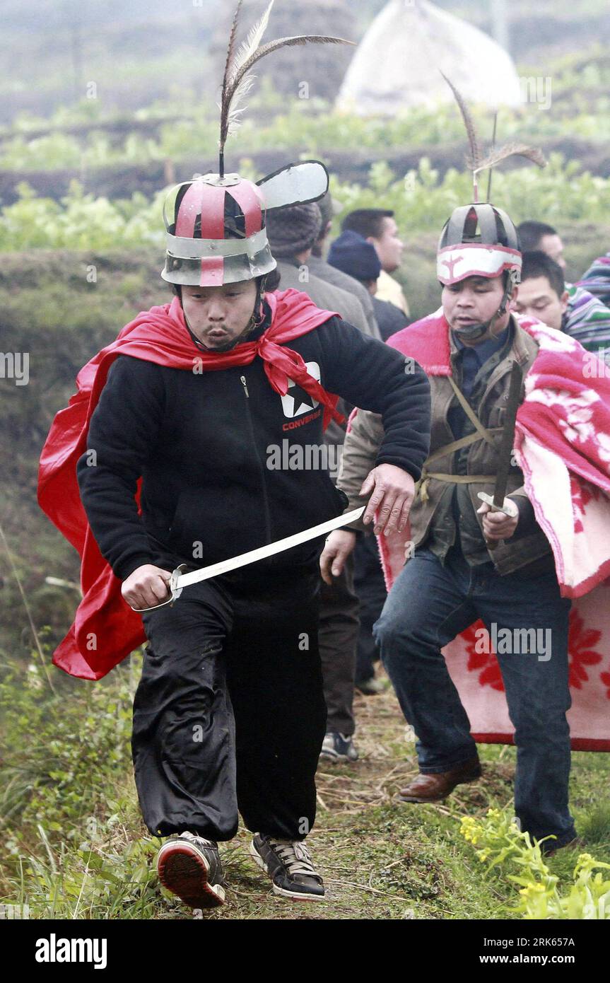 Hands on swords hi-res stock photography and images - Alamy