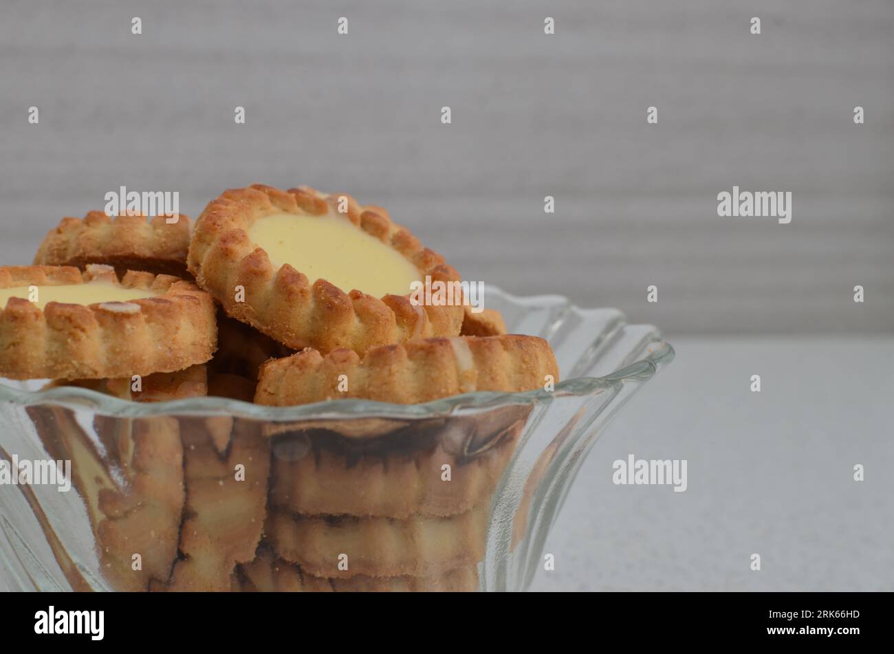 Close-up of delicious biscuits in the form of tartlets filled with ...
