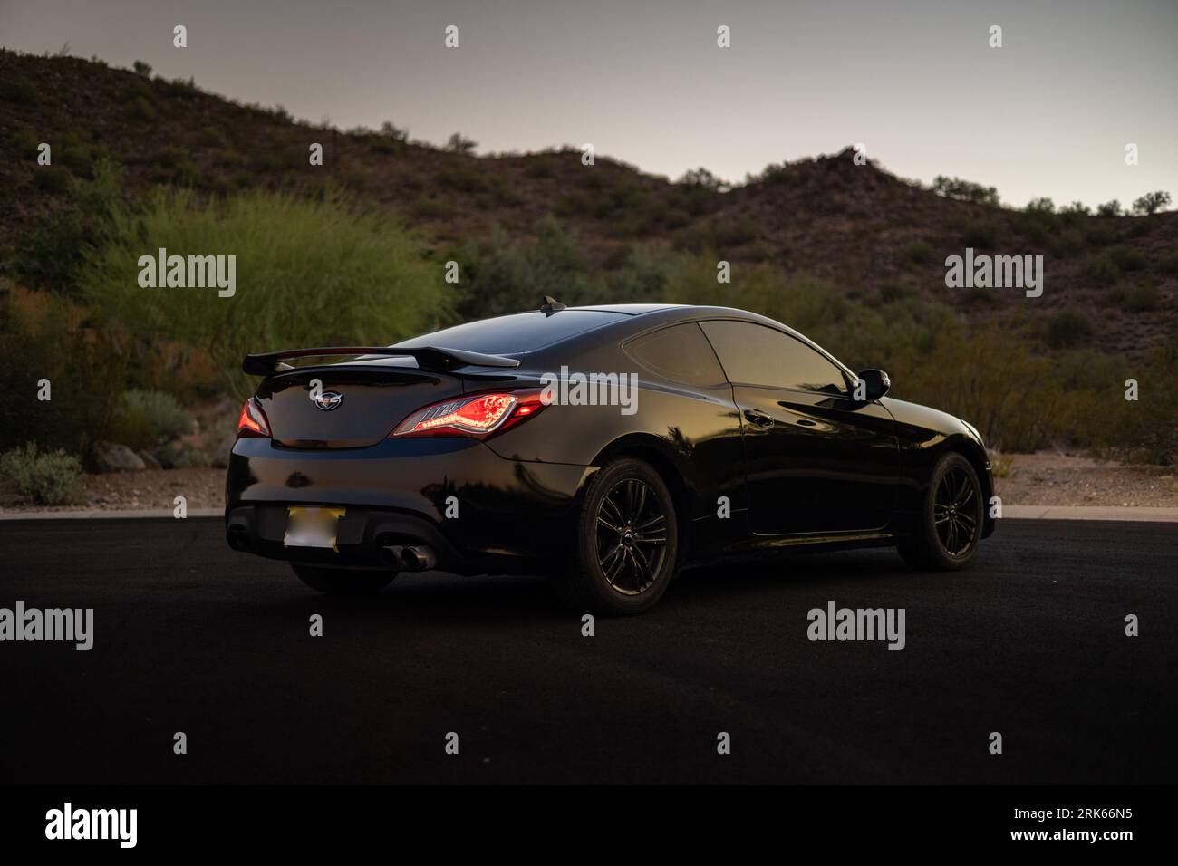 A close-up view of a modern car, illuminated by its headlights Stock ...