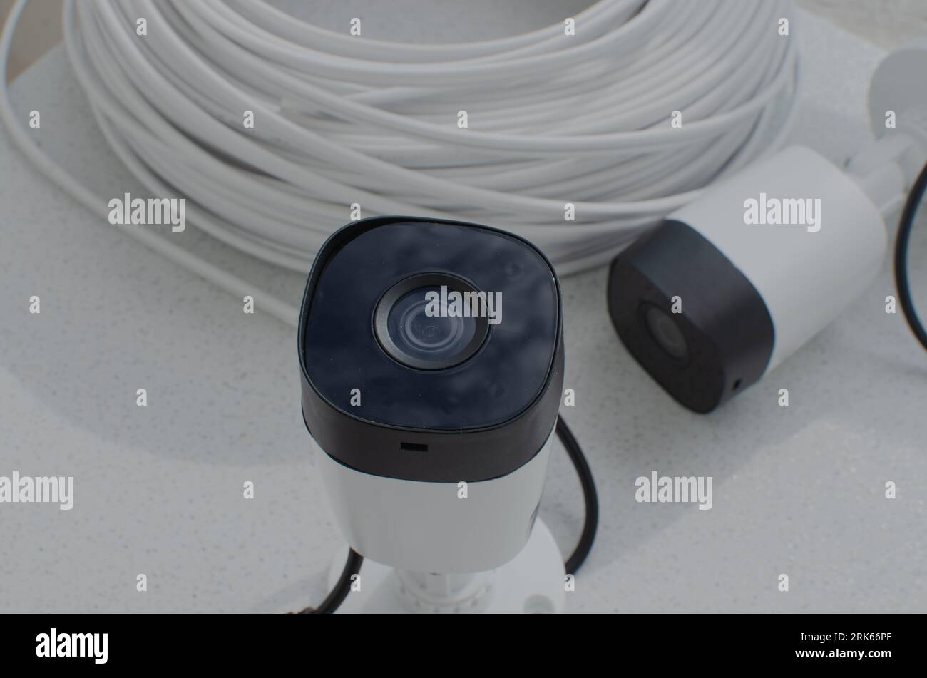 Detail of the security camera with a roll of wire, reinforcing the ...