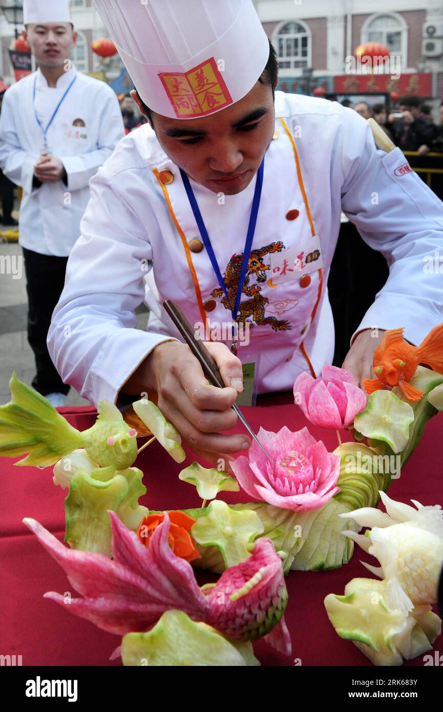 Radish carving hi-res stock photography and images - Alamy