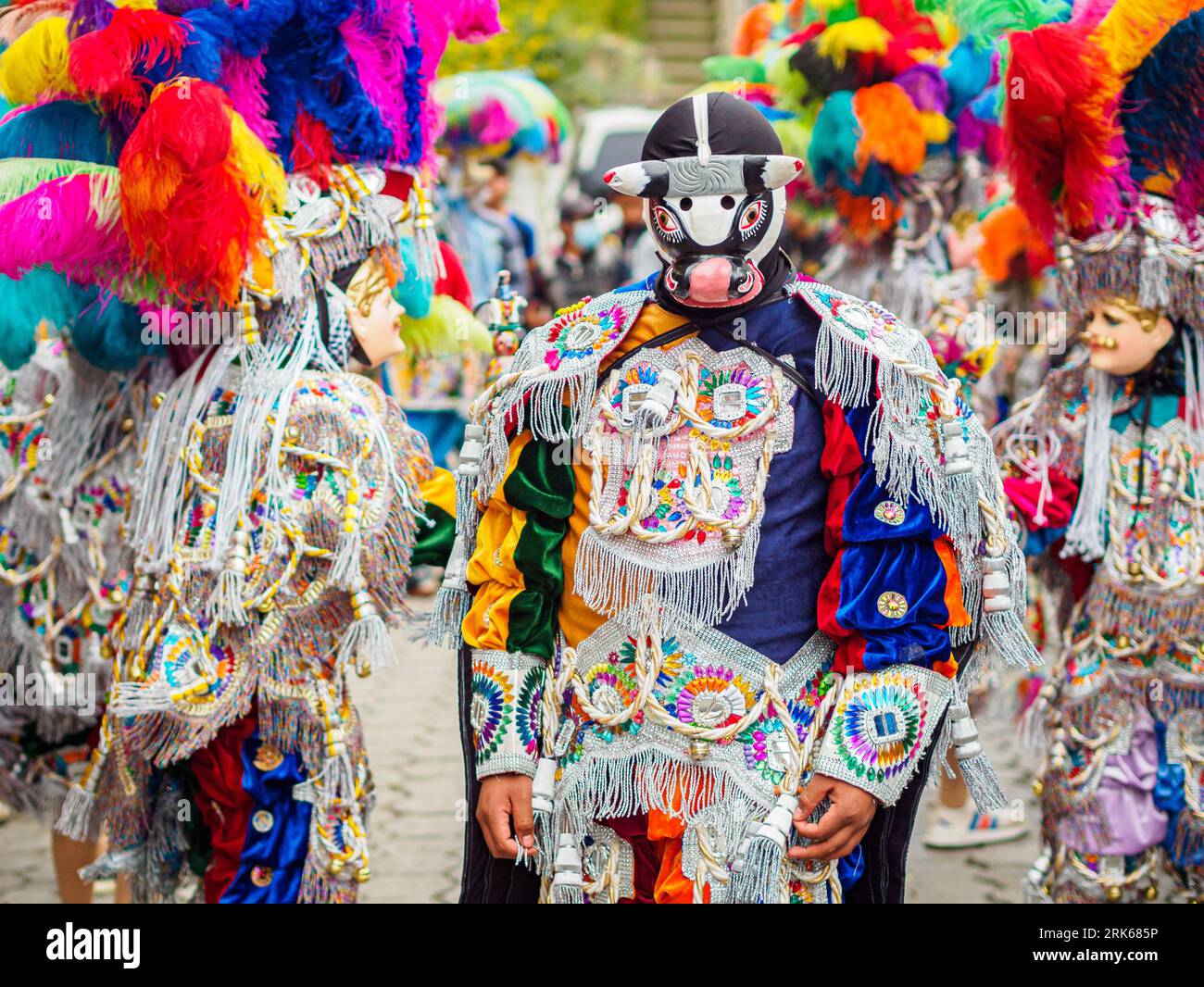 A group of dancers in traditional dress performing the El Torito dance ...