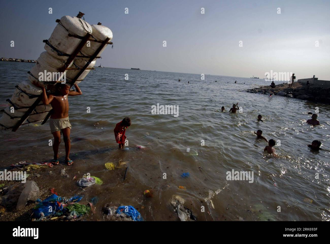 Children dip in the water hi-res stock photography and images - Alamy
