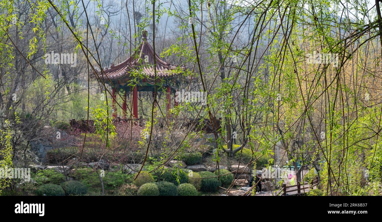 An ancient Asian architectural structure in the middle of a tranquil ...