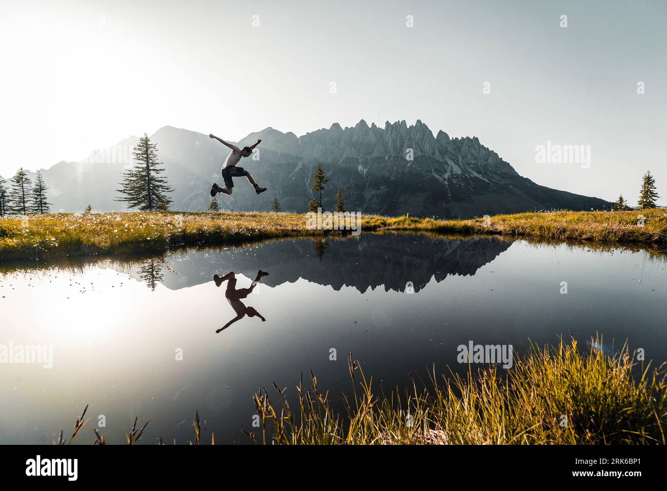 Young man leaping hi-res stock photography and images - Alamy