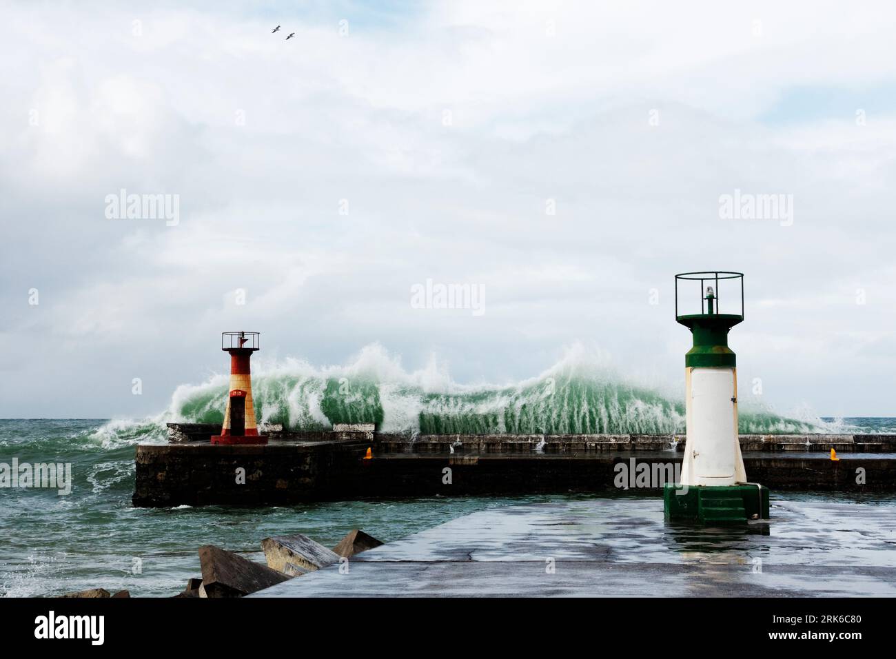 Wave crashes harbour wall Kalk Bay, South Africa Stock Photo - Alamy