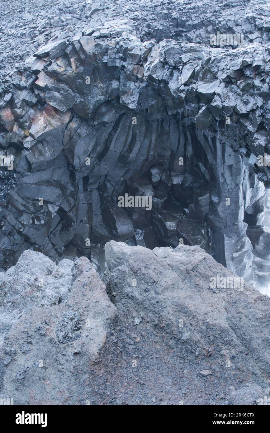 Dramatic Coastal scenery with sea arches and basalt columns near Via ...