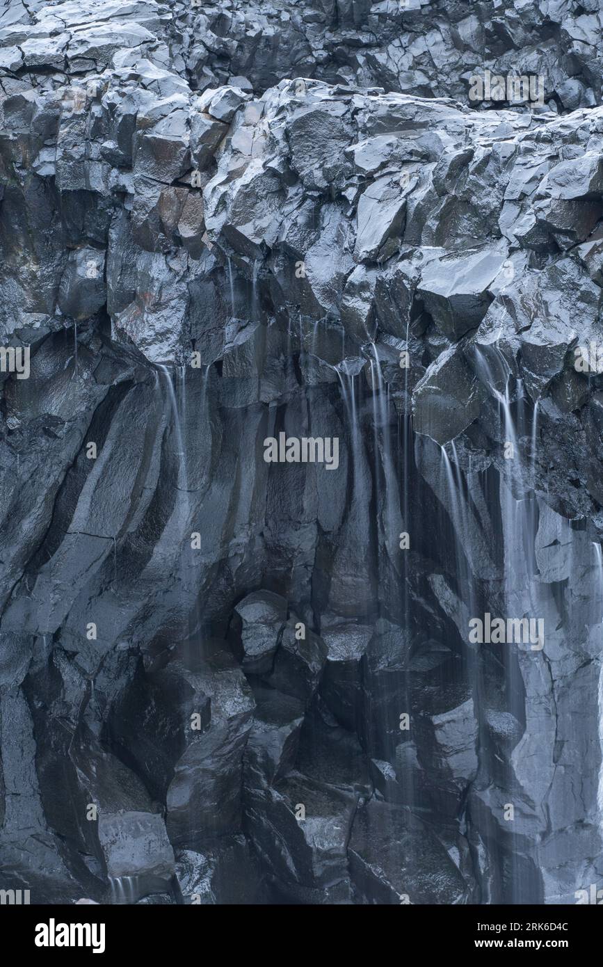 Dramatic Coastal scenery with sea arches and basalt columns near Via ...