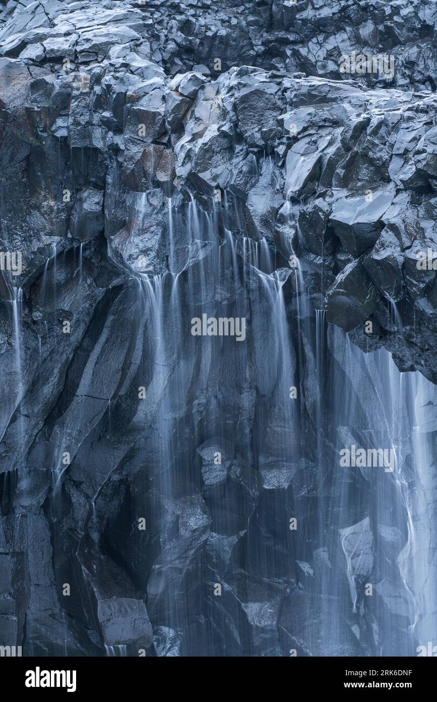 Dramatic Coastal scenery with sea arches and basalt columns near Via ...