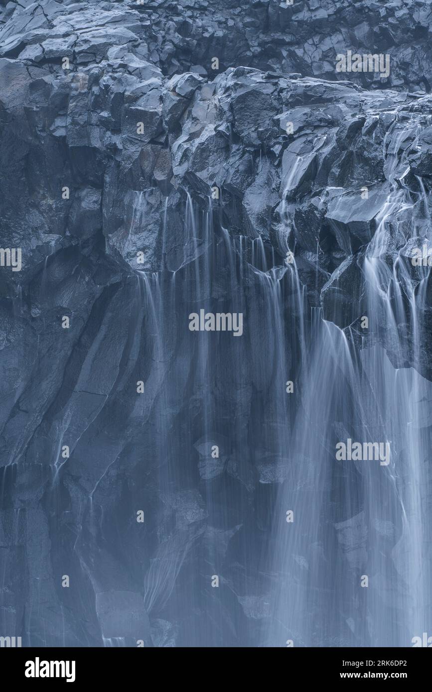 Dramatic Coastal scenery with sea arches and basalt columns near Via ...