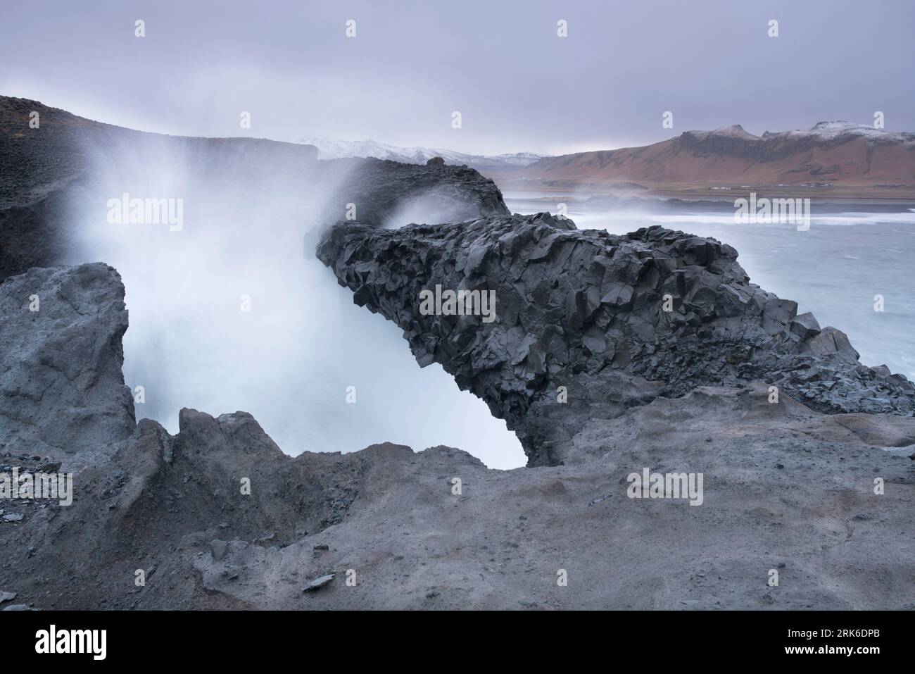 Dramatic Coastal scenery with sea arches and basalt columns near Via ...