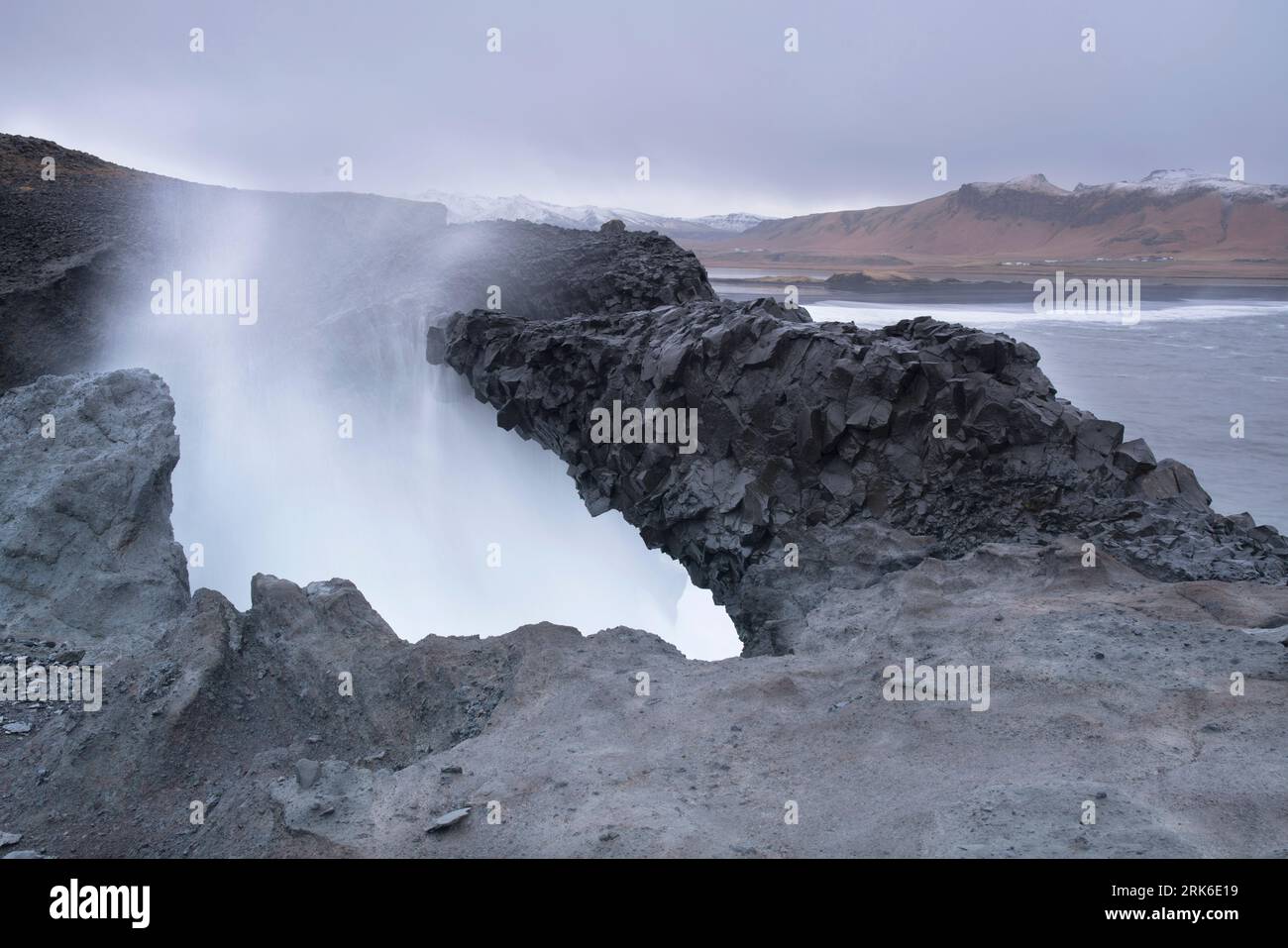 Dramatic Coastal scenery with sea arches and basalt columns near Via ...