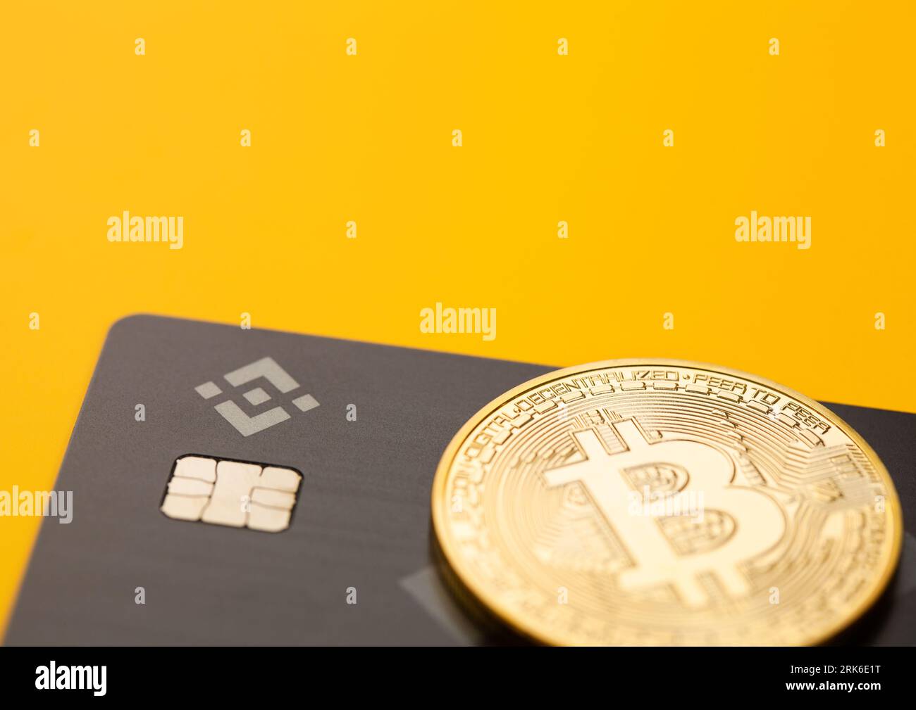 LONDON,UK - NOVEMBER 19, 2022: Binance visa credit card with bitcoin on ...