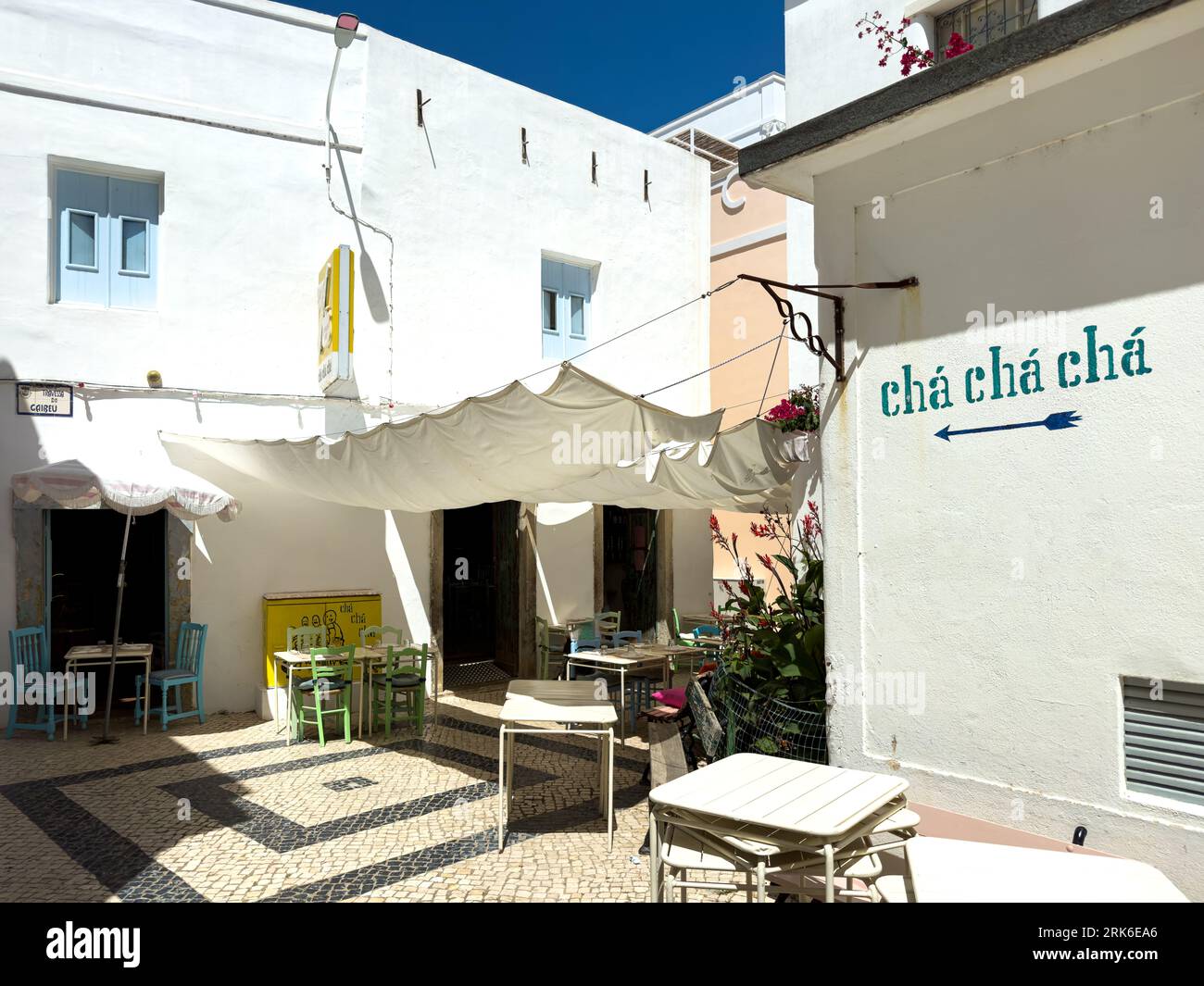 The colourful chairs and tables of the popular Cha Cha Cha restaurant ...