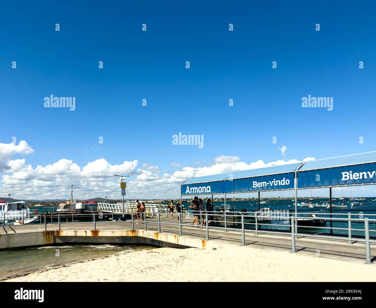 The ferry harbour of Armona island on the Ria Formosa off mainland of ...